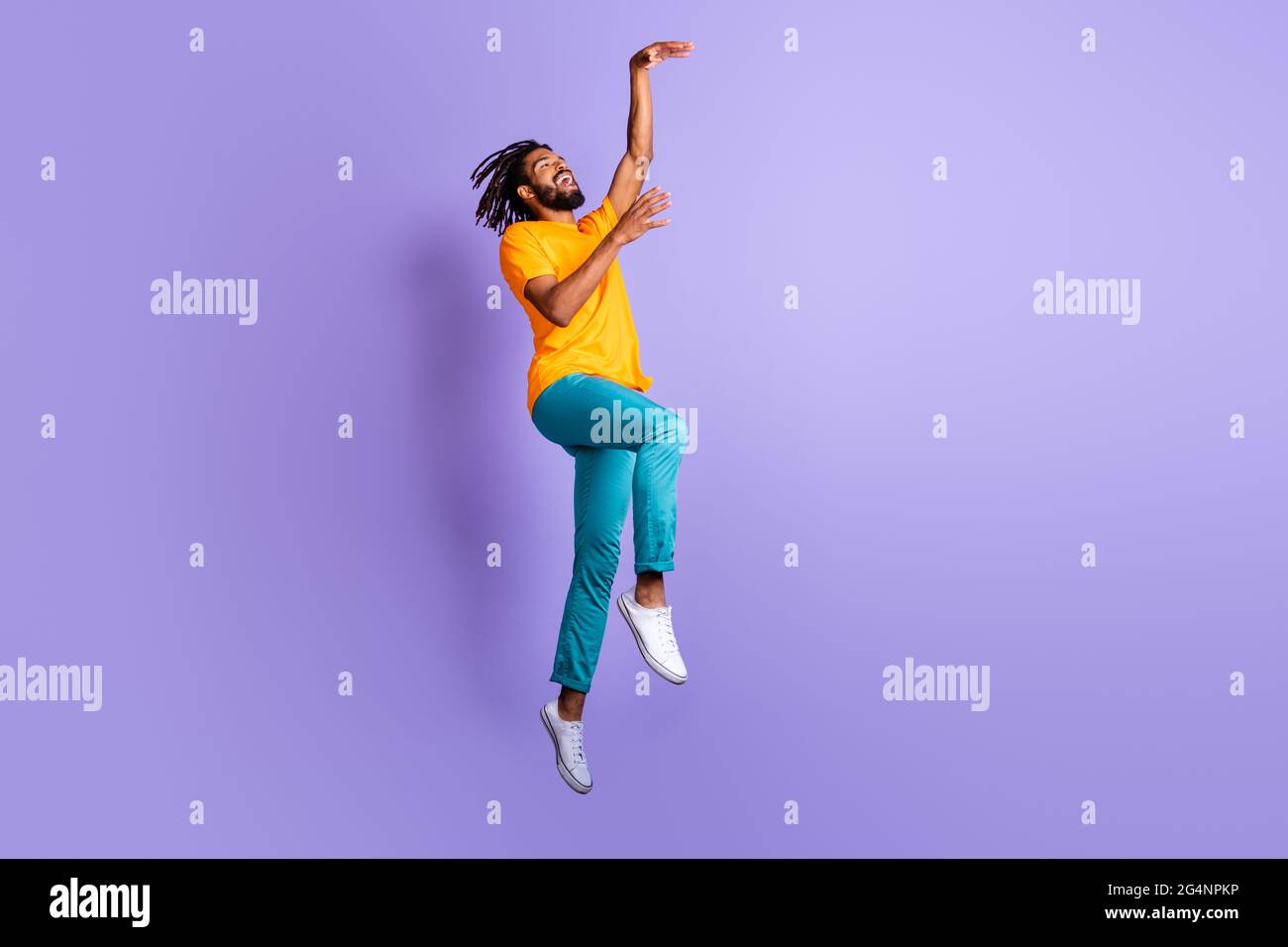 Full size photo of nice optimistic brunet guy jump wear t-shirt pants ...