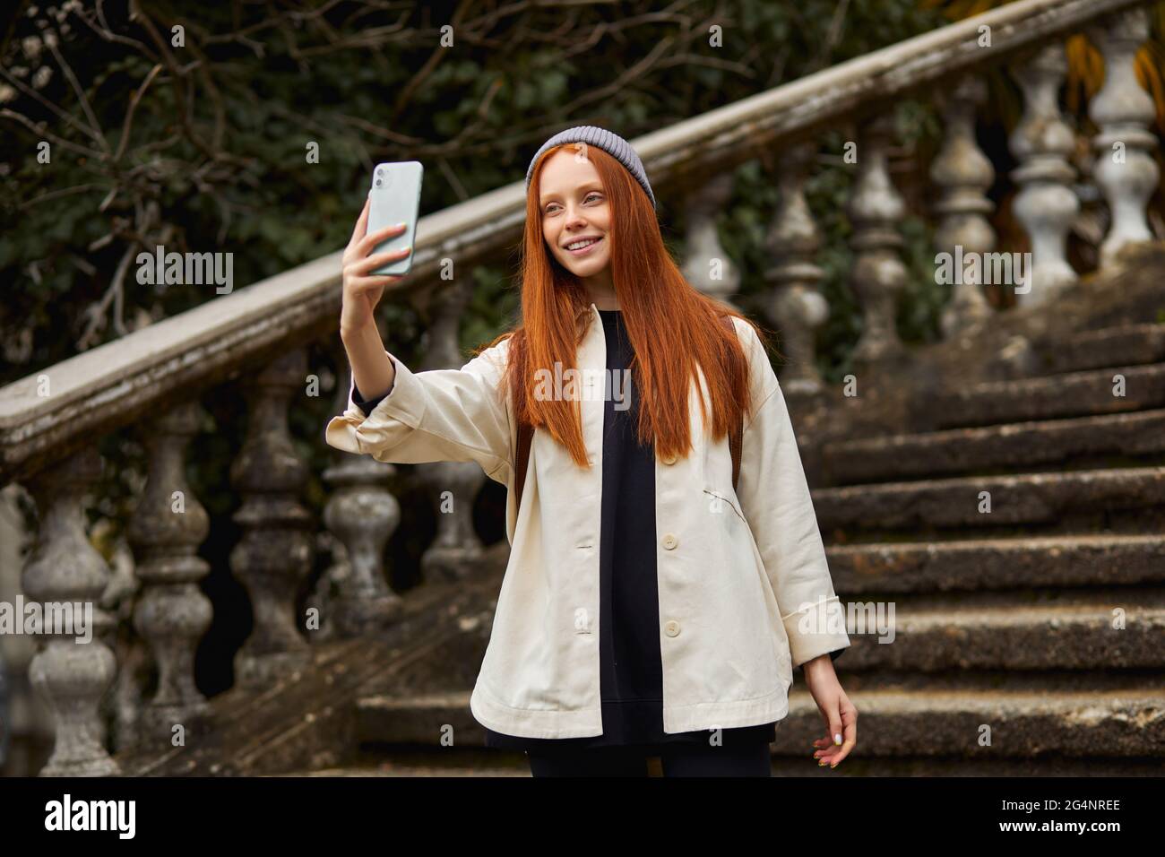 Portrait Of Cute Modern Woman Taking Selfie, Photo On The Background Of ...