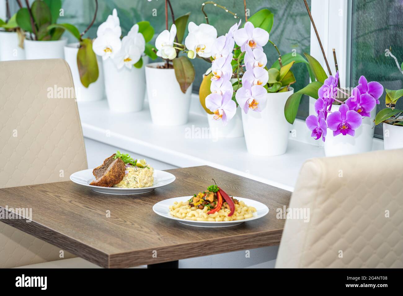 lunch menu on a wooden dining table Stock Photo - Alamy