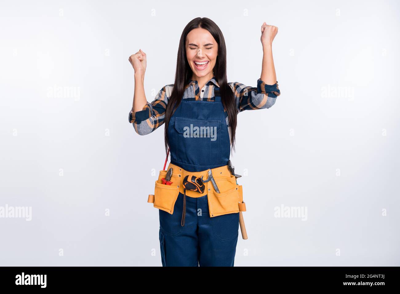 Photo of happy screaming smiling excited woman master raise fists in ...