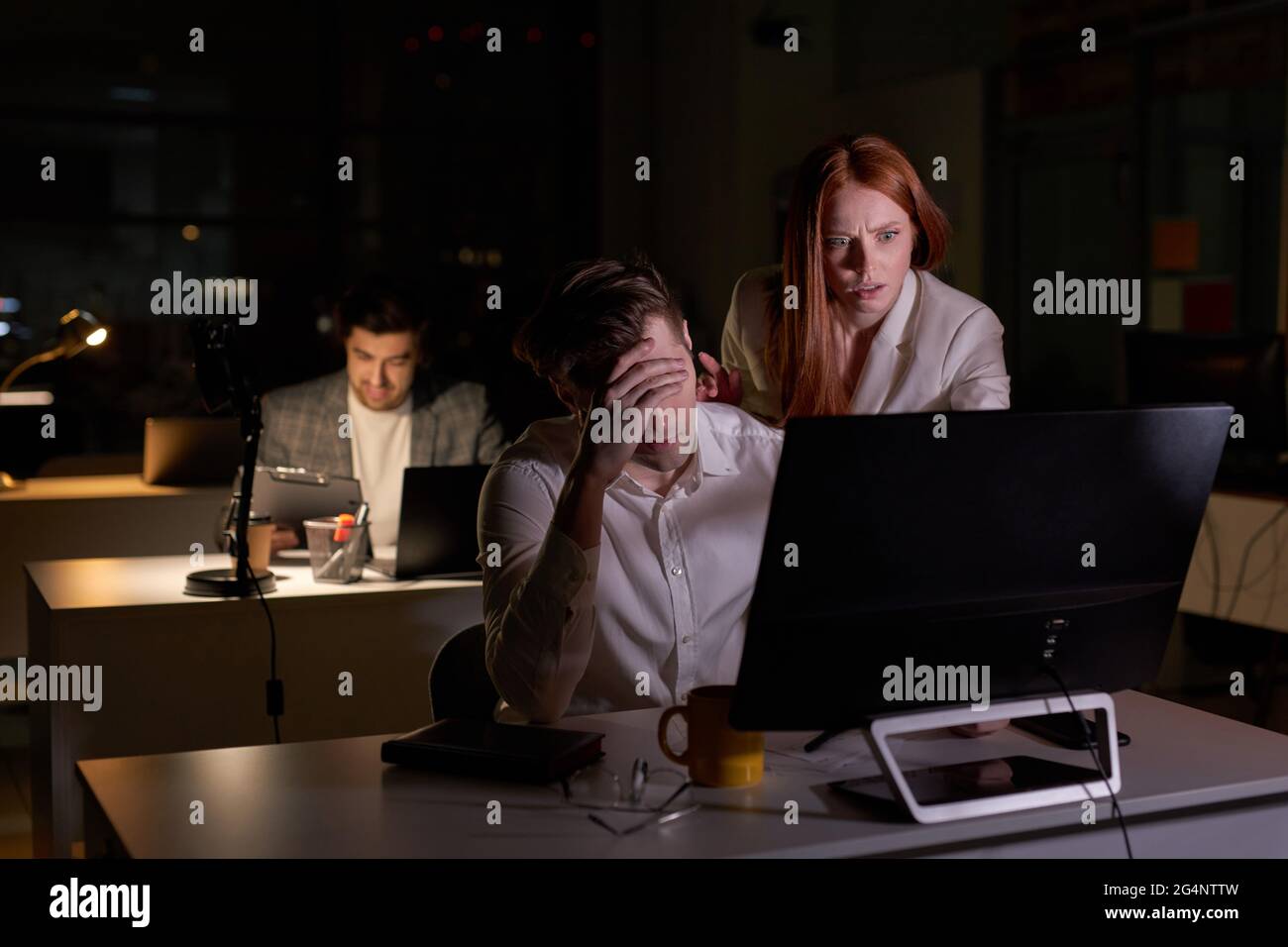 Scared worried anxious redhead woman is dissatisfied with work of male ...