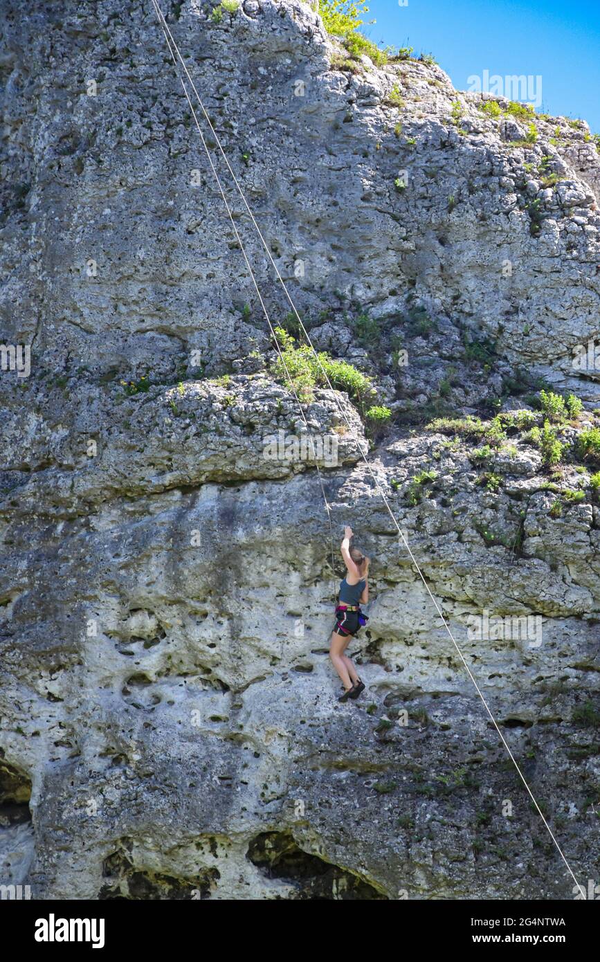 Woman trail climbing on hi-res stock photography and images - Alamy