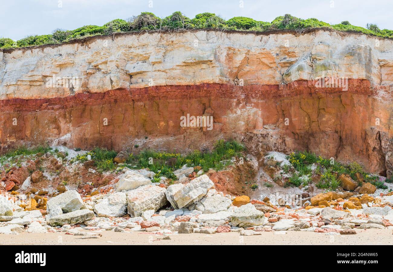 Iconic cliffs of Hunstanton showing the layers of rock which are slowly ...