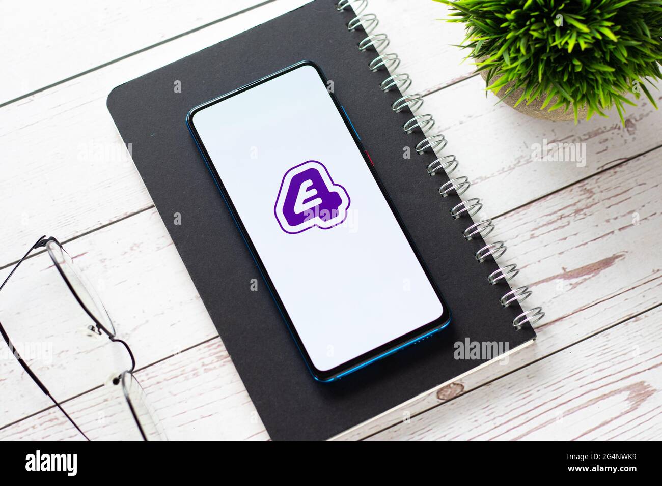 E4 tv logo on phone screen stock image Stock Photo - Alamy