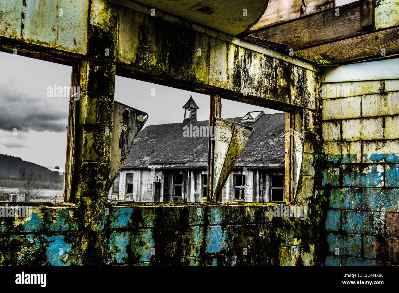 Shot through the broken windows of an abandoned mental hospital in ...