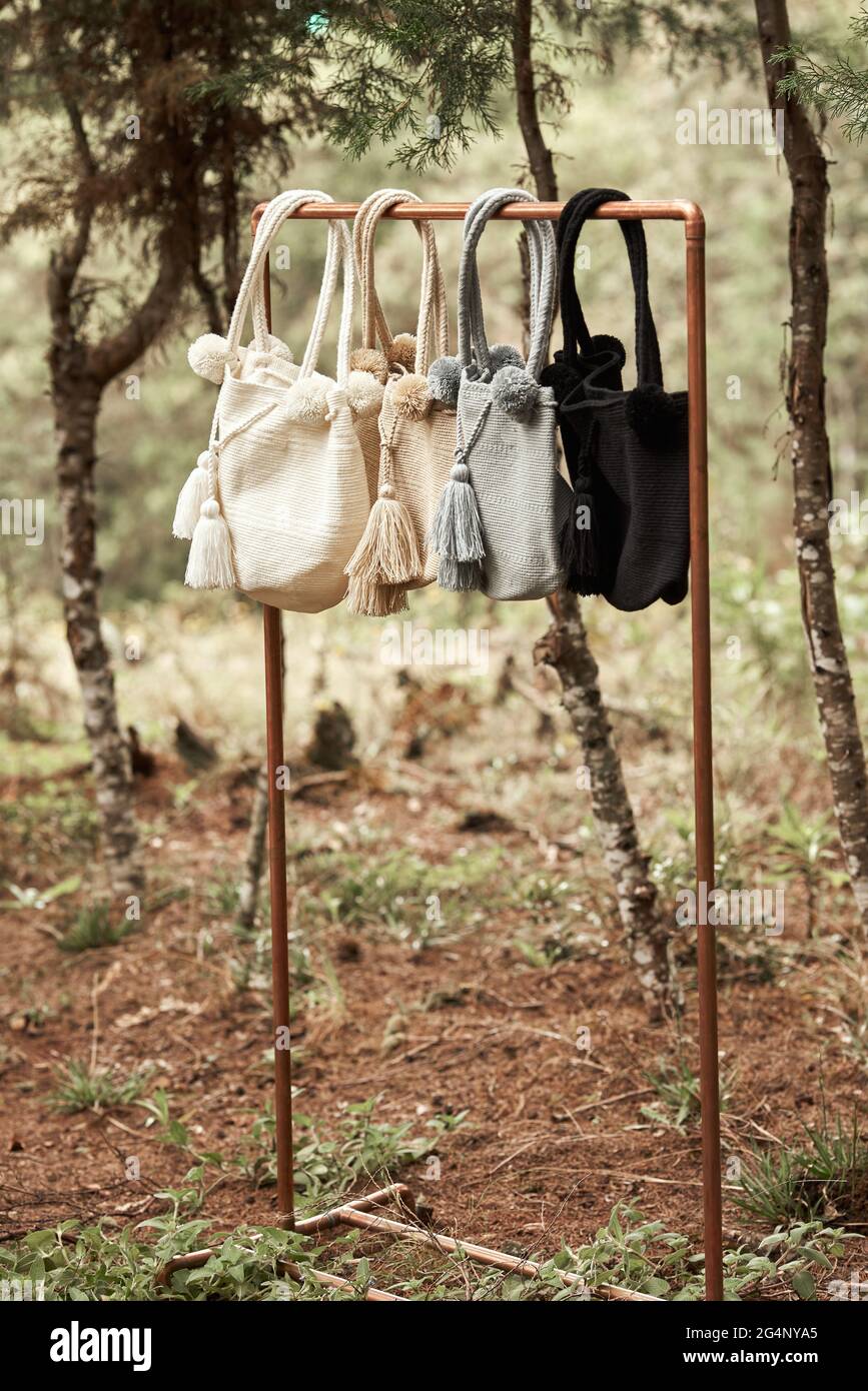 Hanging bags showcase hi-res stock photography and images - Alamy