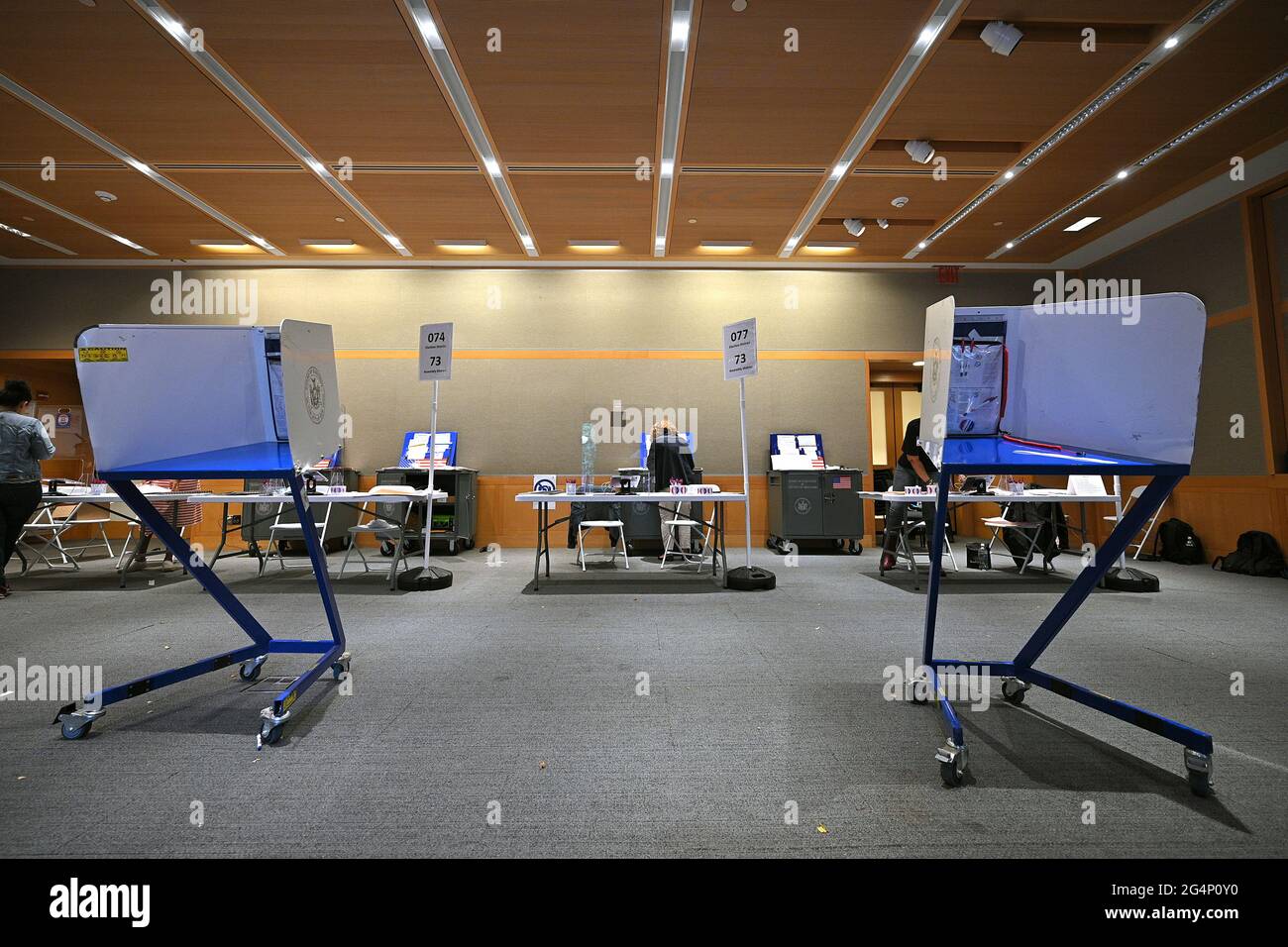 New York, USA. 22nd June, 2021. Unoccupied privacy voting booths at a ...