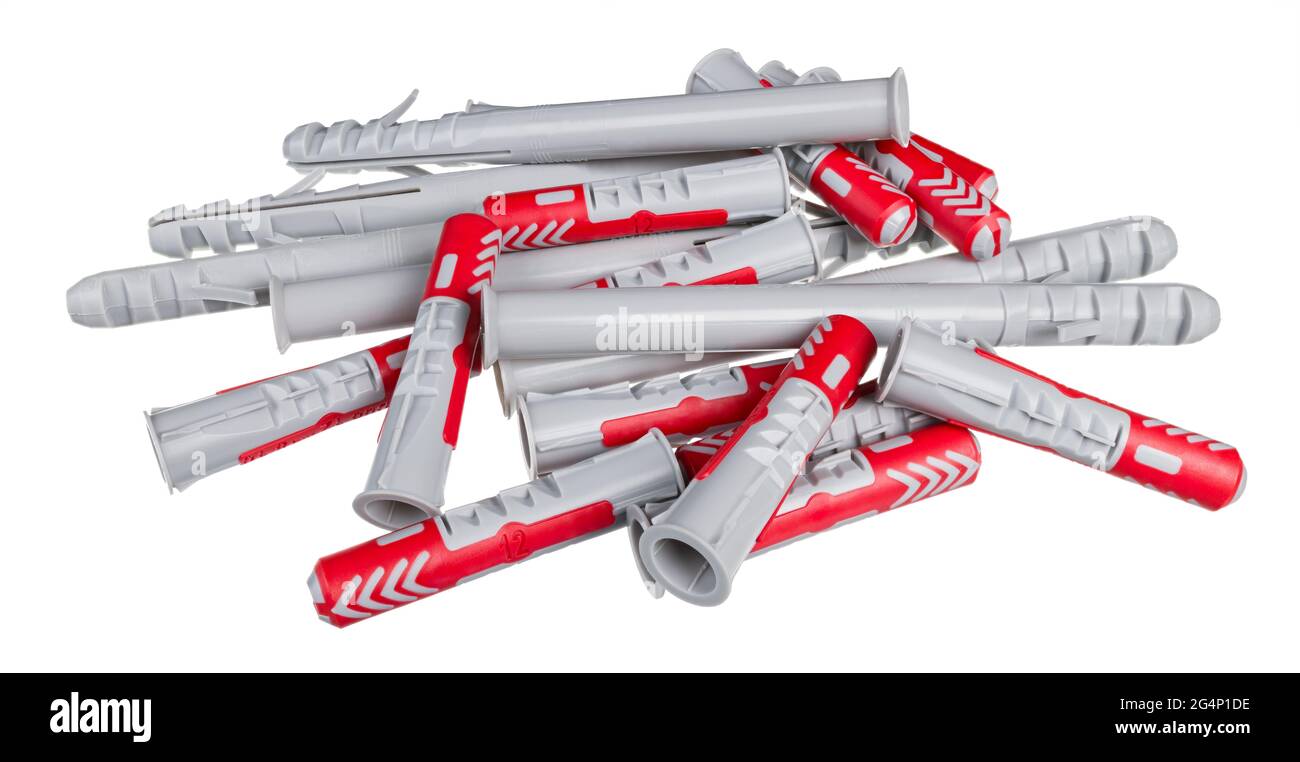 Pile of universal expansion plastic anchors isolated on a white ...