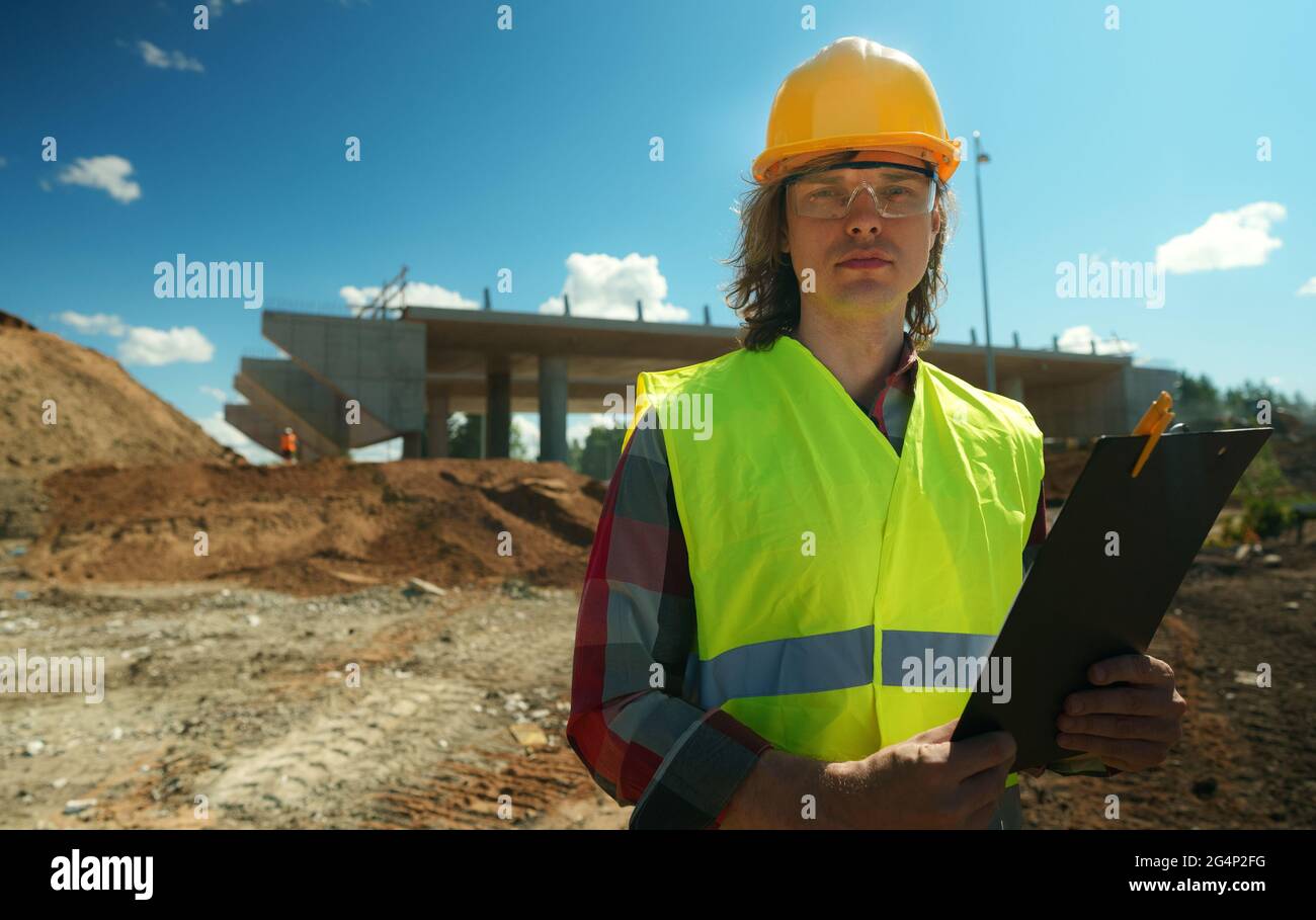 Construction supervisor checking documents hi-res stock photography and ...