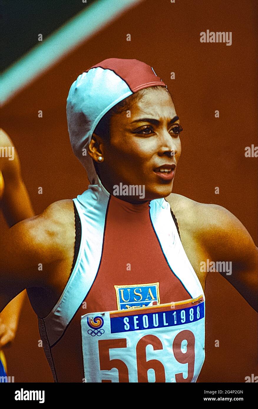 Florence Griffith Joyner (USA) wins the gold medal in the Women's 200m ...