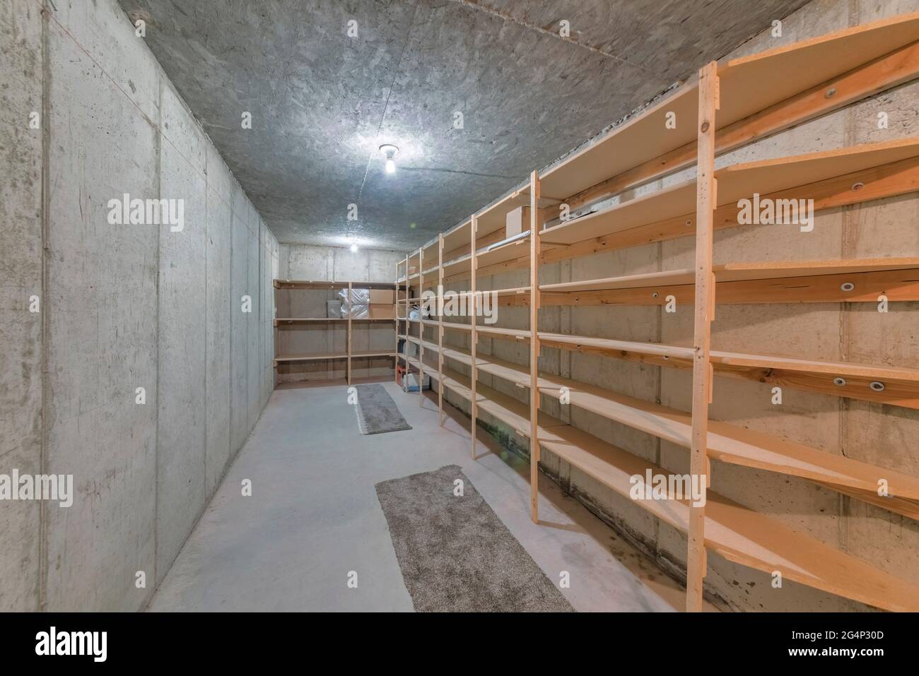 The brown wooden shelves and racks in the cold storage or food storage ...