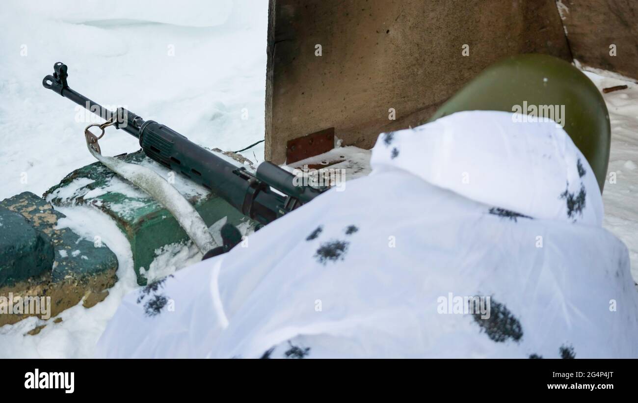 Moscow, Russia. 07th Feb, 2018. A sniper at a firing position is ...