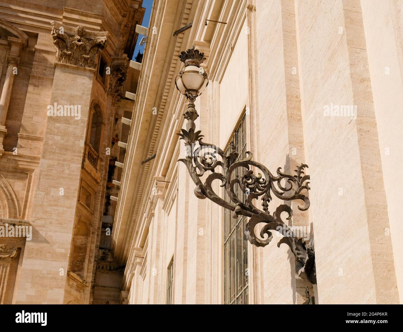 Vatican city, Saint Peter's Square. Elaborated exterior lamp in a ...