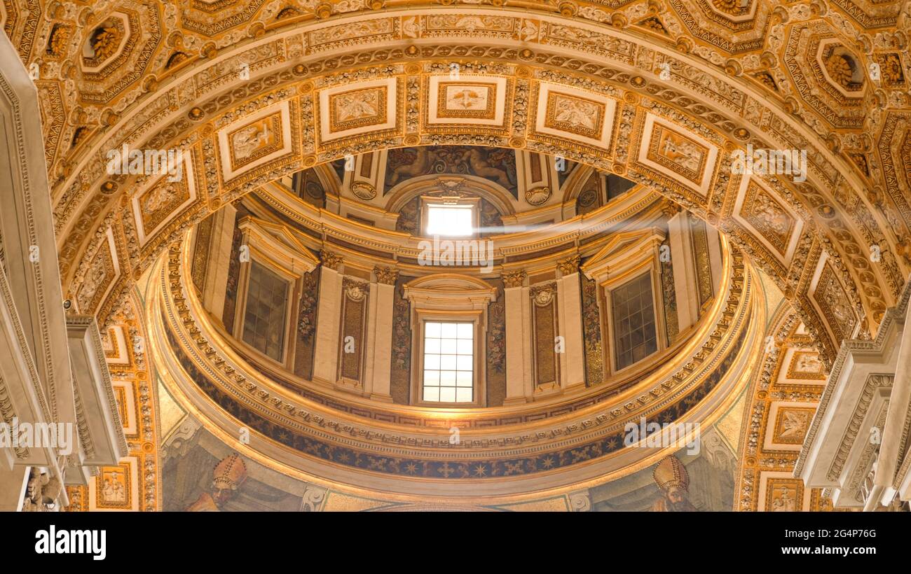 Vatican city. The sun making light effects at Saint Peter's Basilica ...