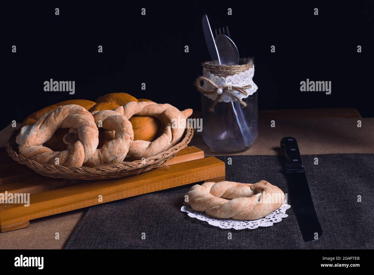 bread with thread on the table ready to cut with the knife Stock Photo ...