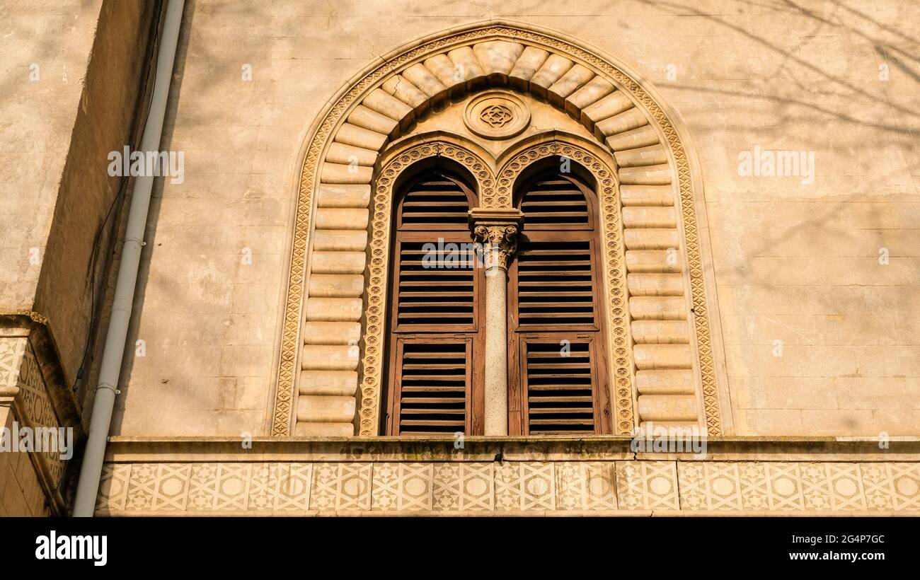 Details of a moorish style window, that strangely belongs to a building ...