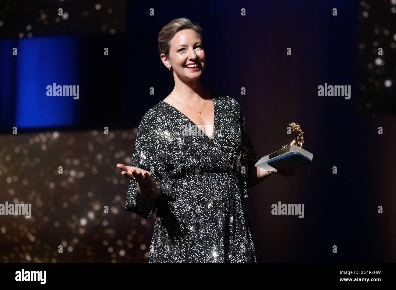 Anna Marsh poses with the Best Serie Golden Nymph award for the serie ...