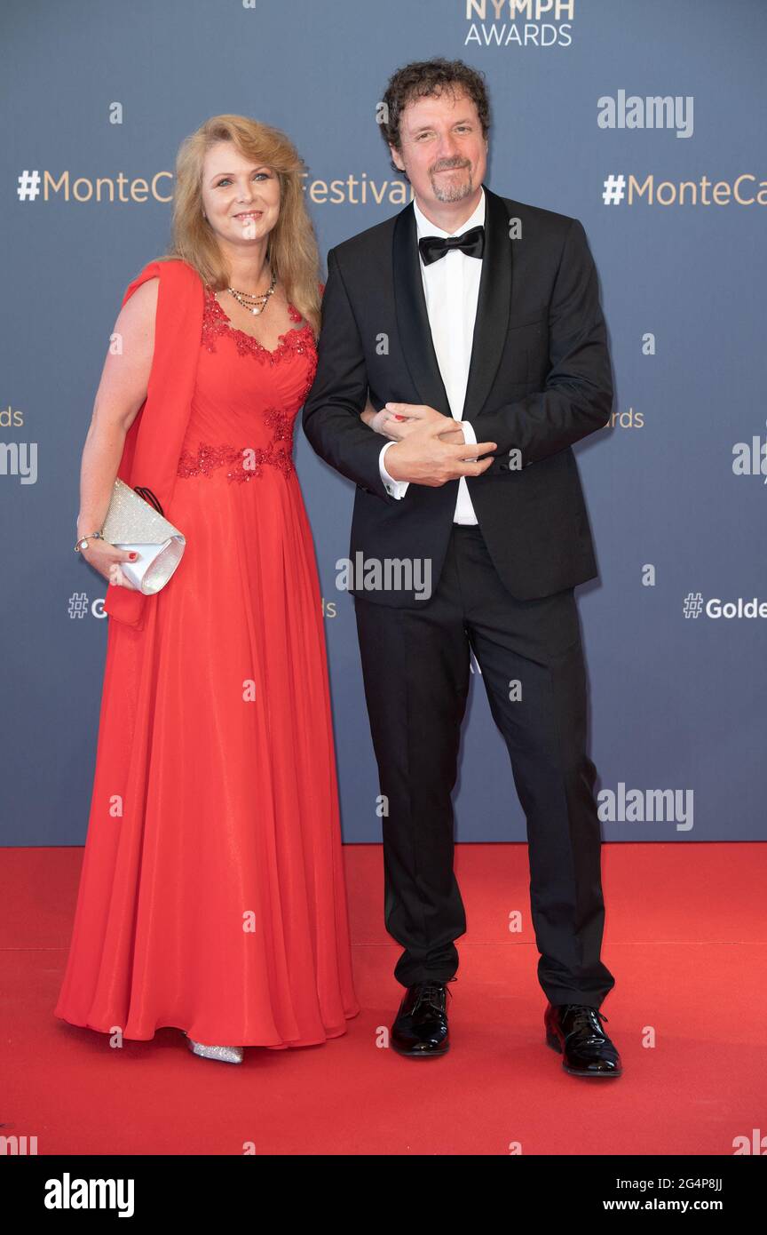 Michal Reitler and a guest attend the closing ceremony of the 60th ...