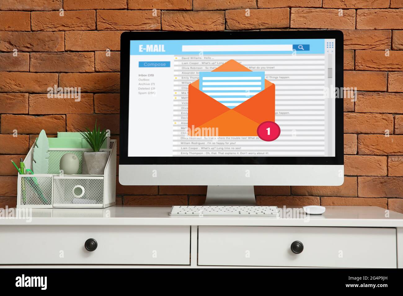 Received email message on screen of computer monitor at workplace Stock ...