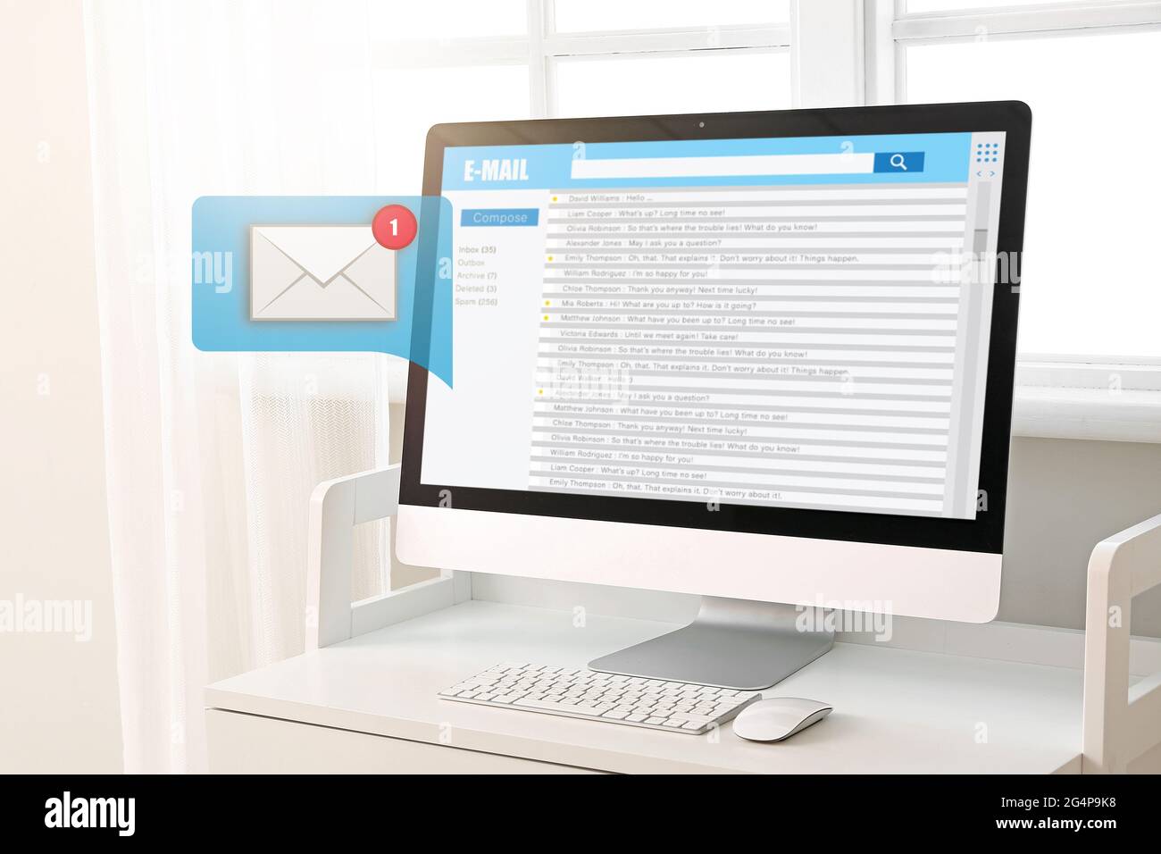 Received email message on screen of computer monitor at workplace Stock ...