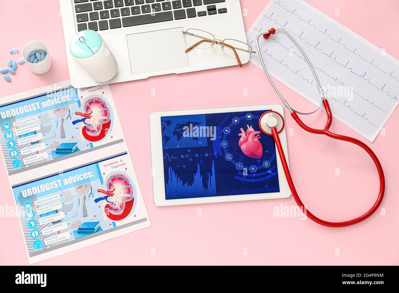 Tablet computer with stethoscope, cardiogram and accessories of ...