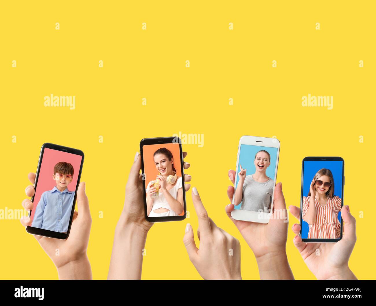 Group of people with mobile phones taking photo on color background ...