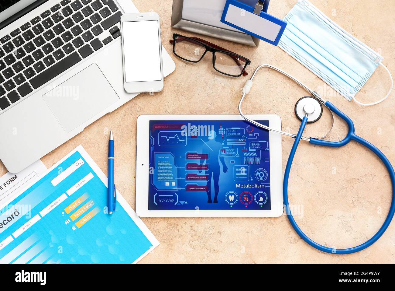 Tablet computer with stethoscope and accessories of doctor on color ...