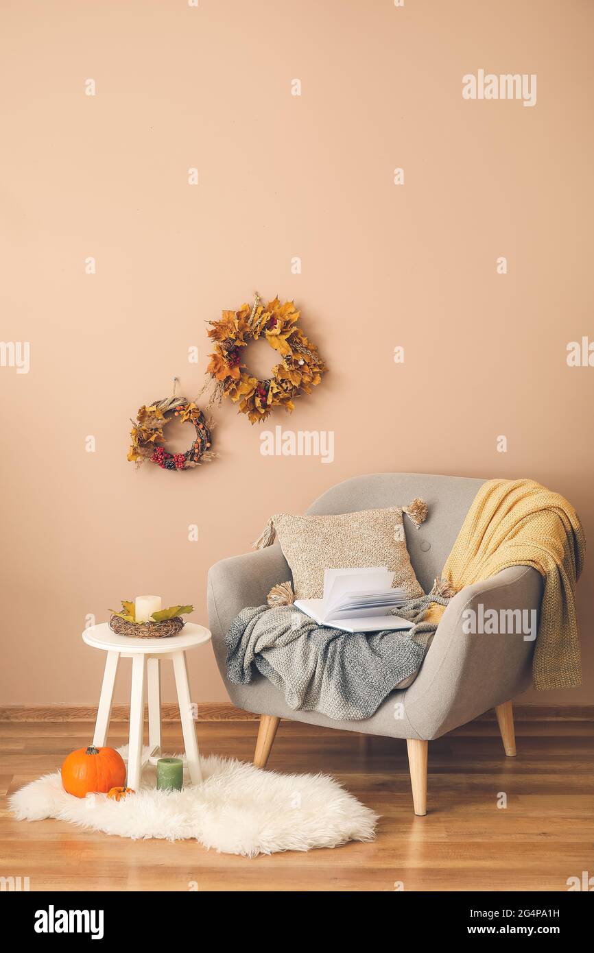 Stylish interior of living room with autumn decor Stock Photo - Alamy