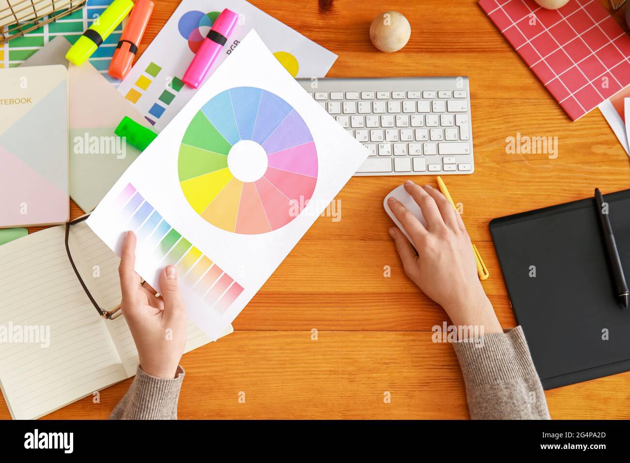 Female designer working in office, top view Stock Photo - Alamy