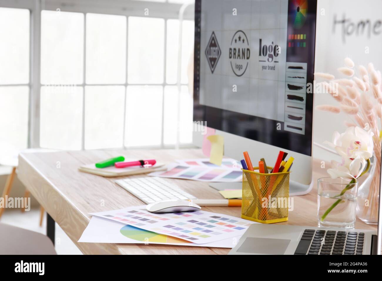 Comfortable workplace of graphic designer in office Stock Photo - Alamy