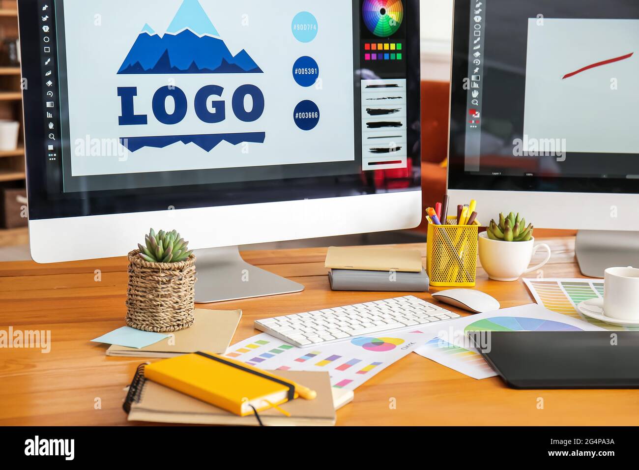 Comfortable workplace of graphic designer in office Stock Photo - Alamy