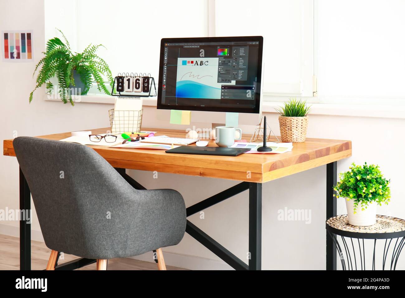 Comfortable workplace of graphic designer in office Stock Photo - Alamy