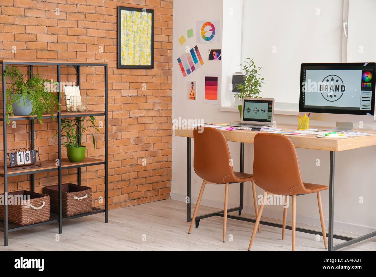 Comfortable workplace of graphic designer in office Stock Photo - Alamy