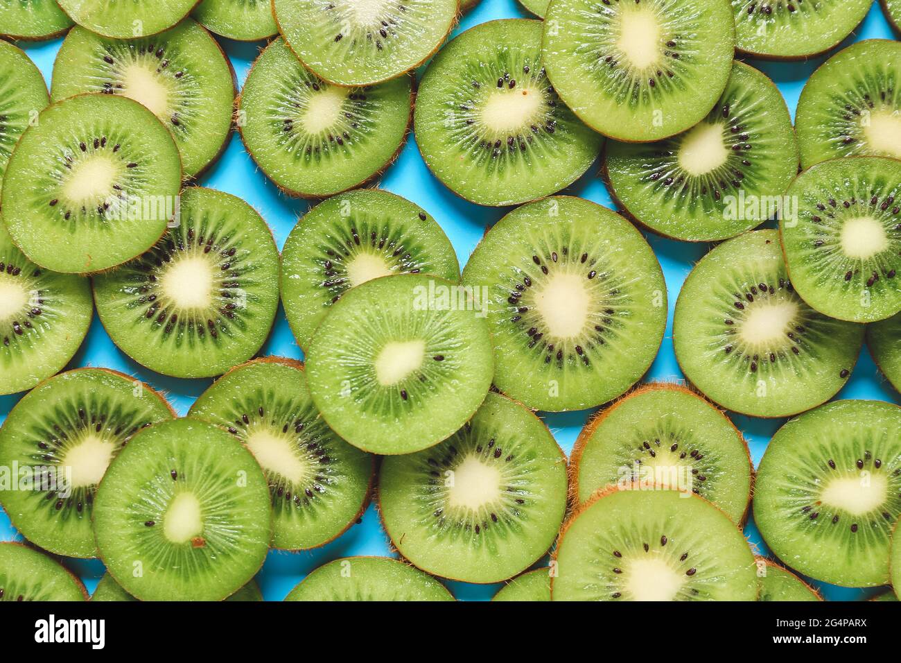 Many cut kiwi as background Stock Photo - Alamy