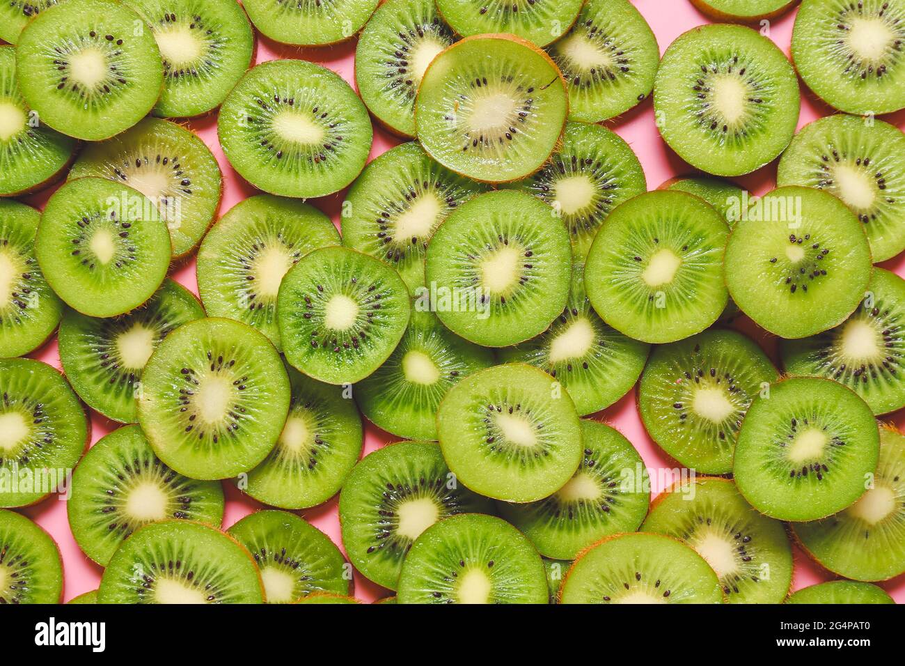 Many cut kiwi as background Stock Photo - Alamy
