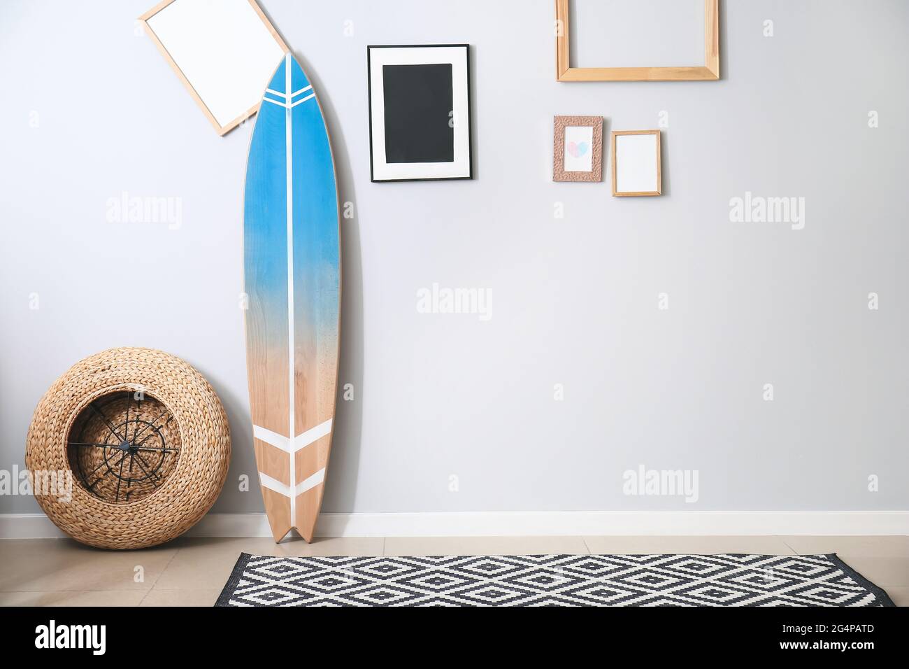 Interior of modern stylish room with surfboard Stock Photo - Alamy
