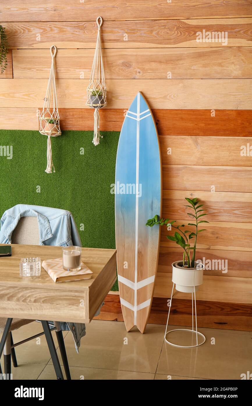 Interior of modern room with surfboard Stock Photo - Alamy