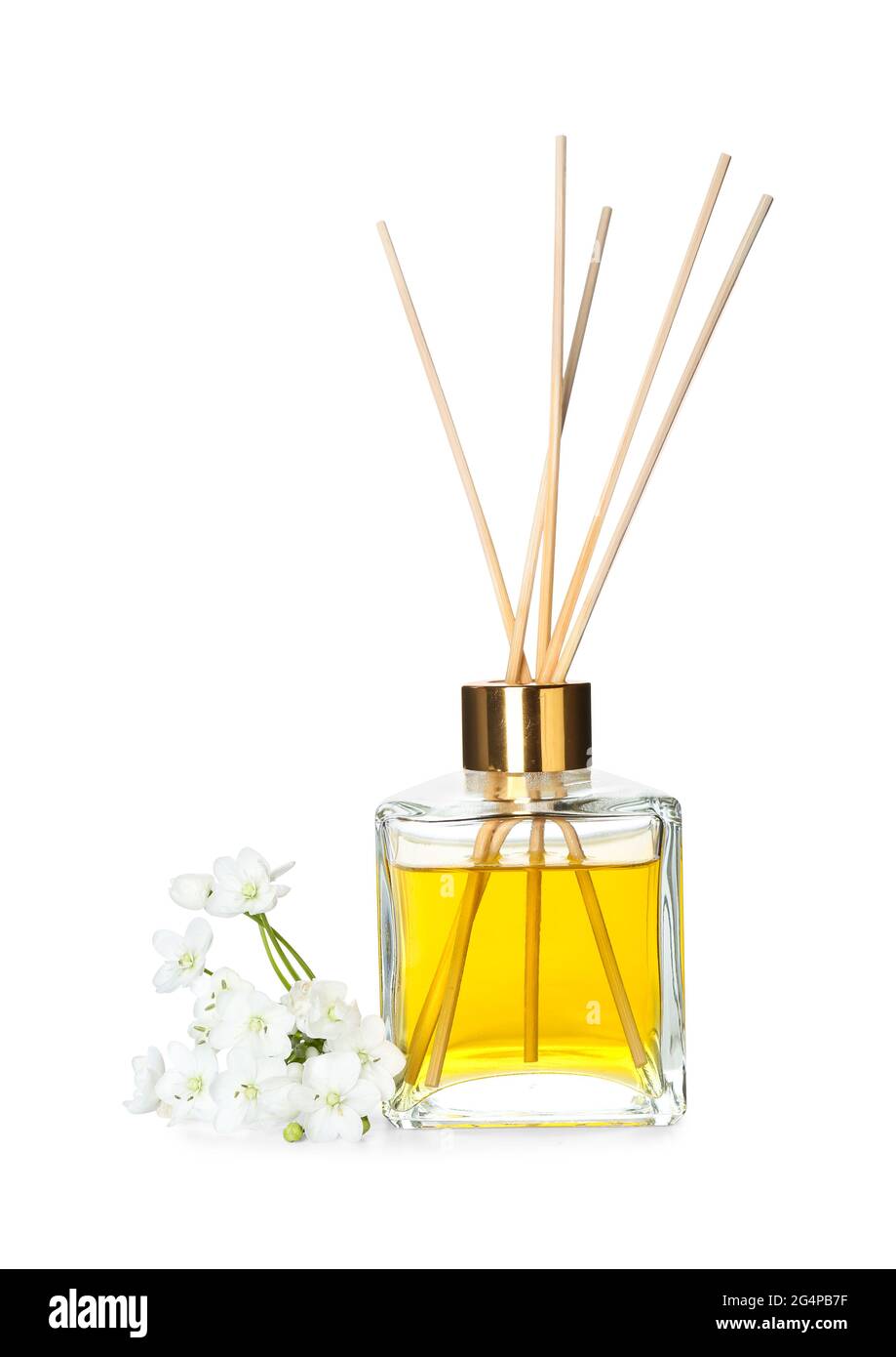 Floral reed diffuser on white background Stock Photo - Alamy