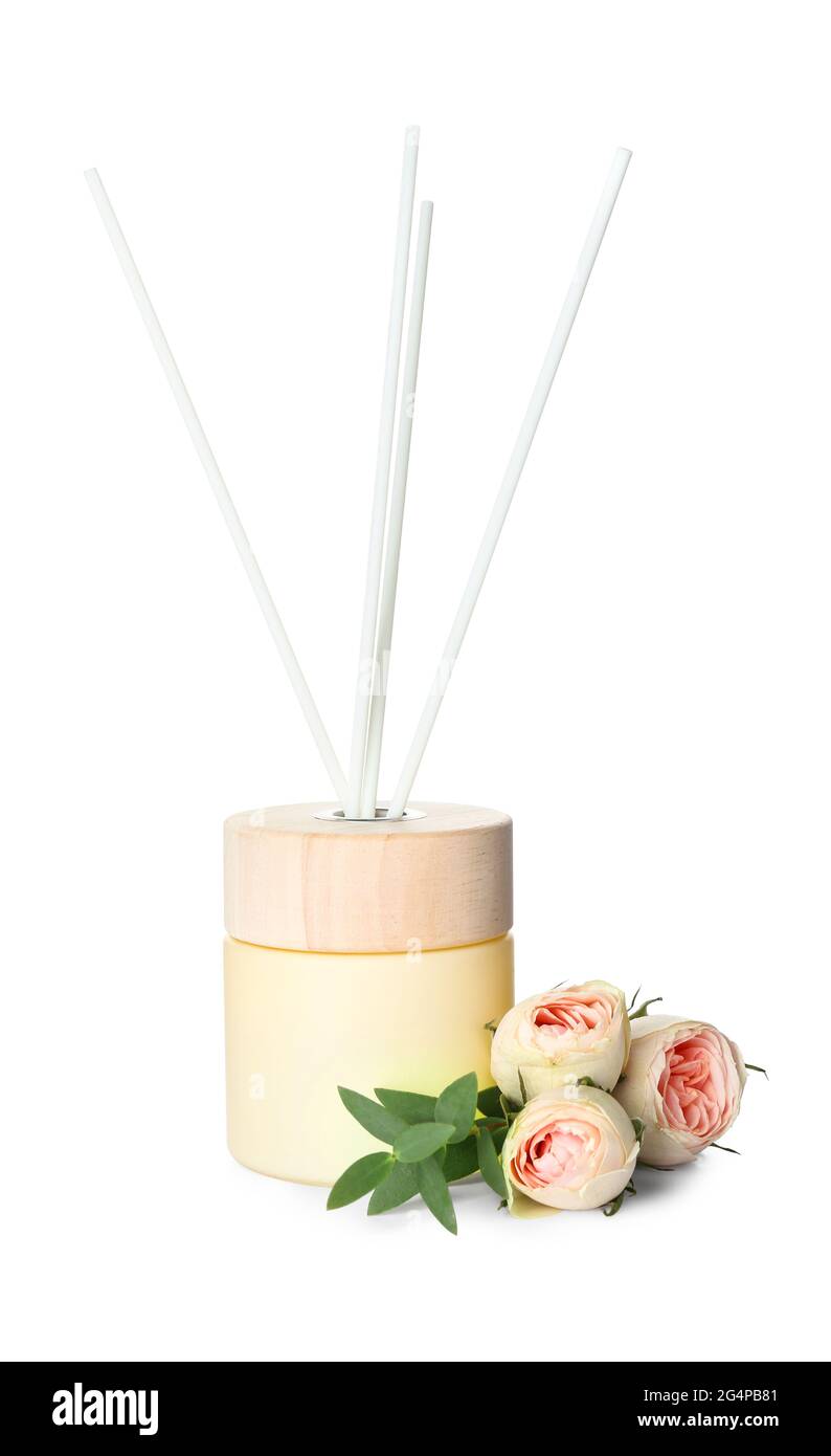 Floral reed diffuser on white background Stock Photo - Alamy