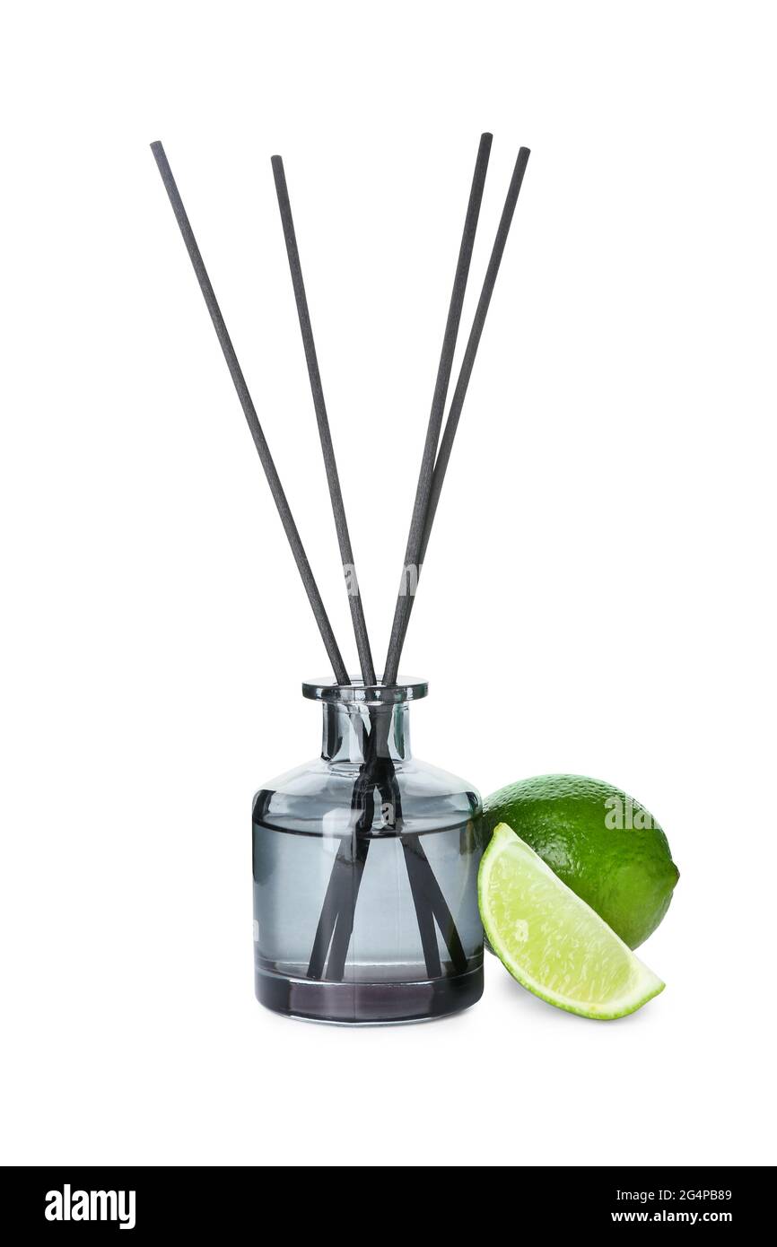 Citrus reed diffuser on white background Stock Photo - Alamy