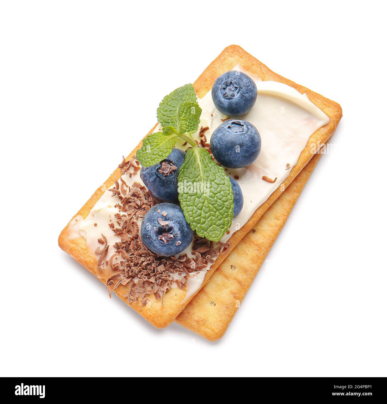 Tasty crackers with blueberry and chocolate on white background Stock ...