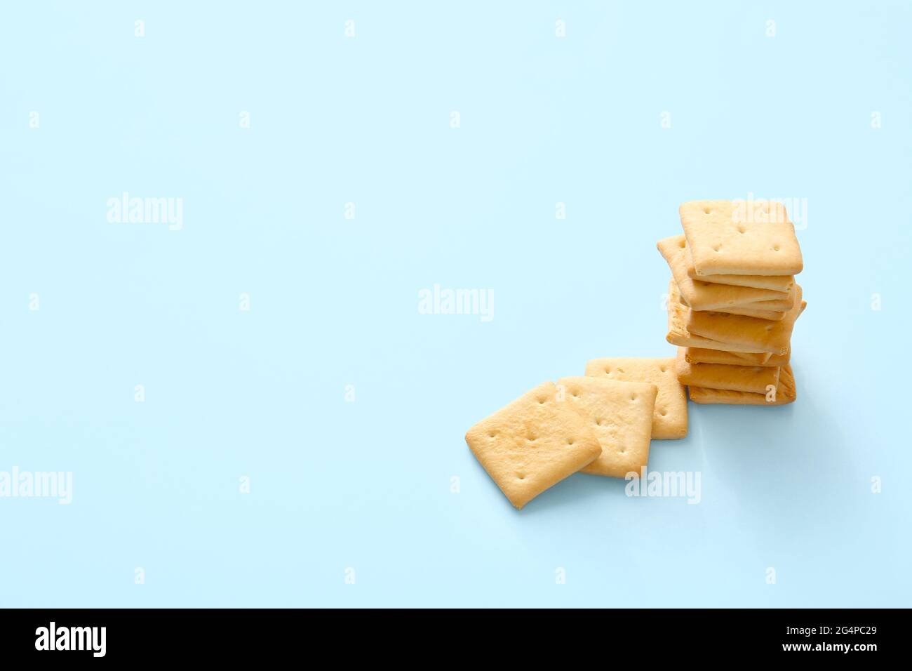 Tasty crackers on color background Stock Photo - Alamy