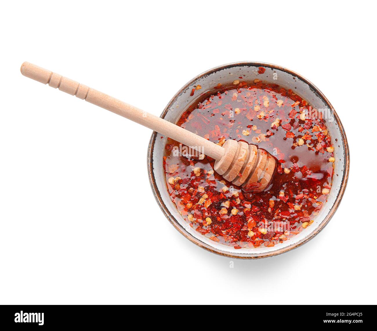 Bowl of hot honey on white background Stock Photo - Alamy