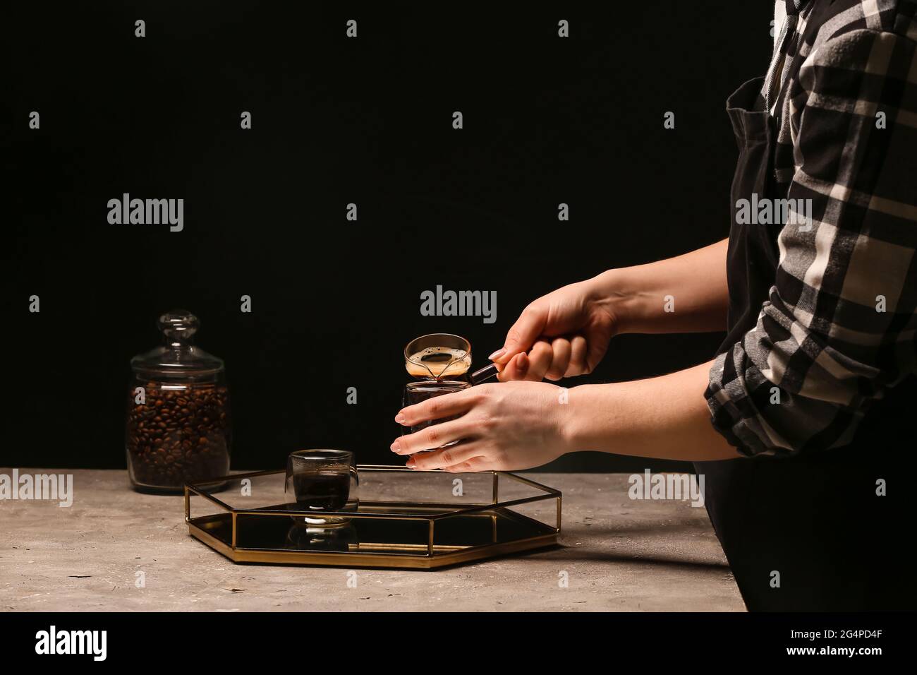 Female barista making delicious turkish coffee at table, closeup Stock ...