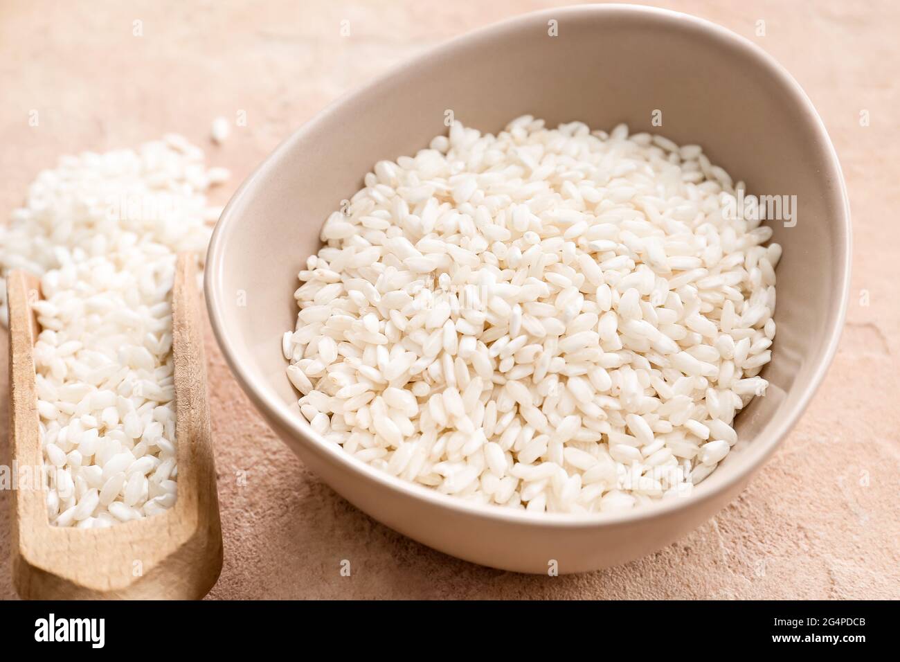 Raw pink rice in bowl hi-res stock photography and images - Alamy