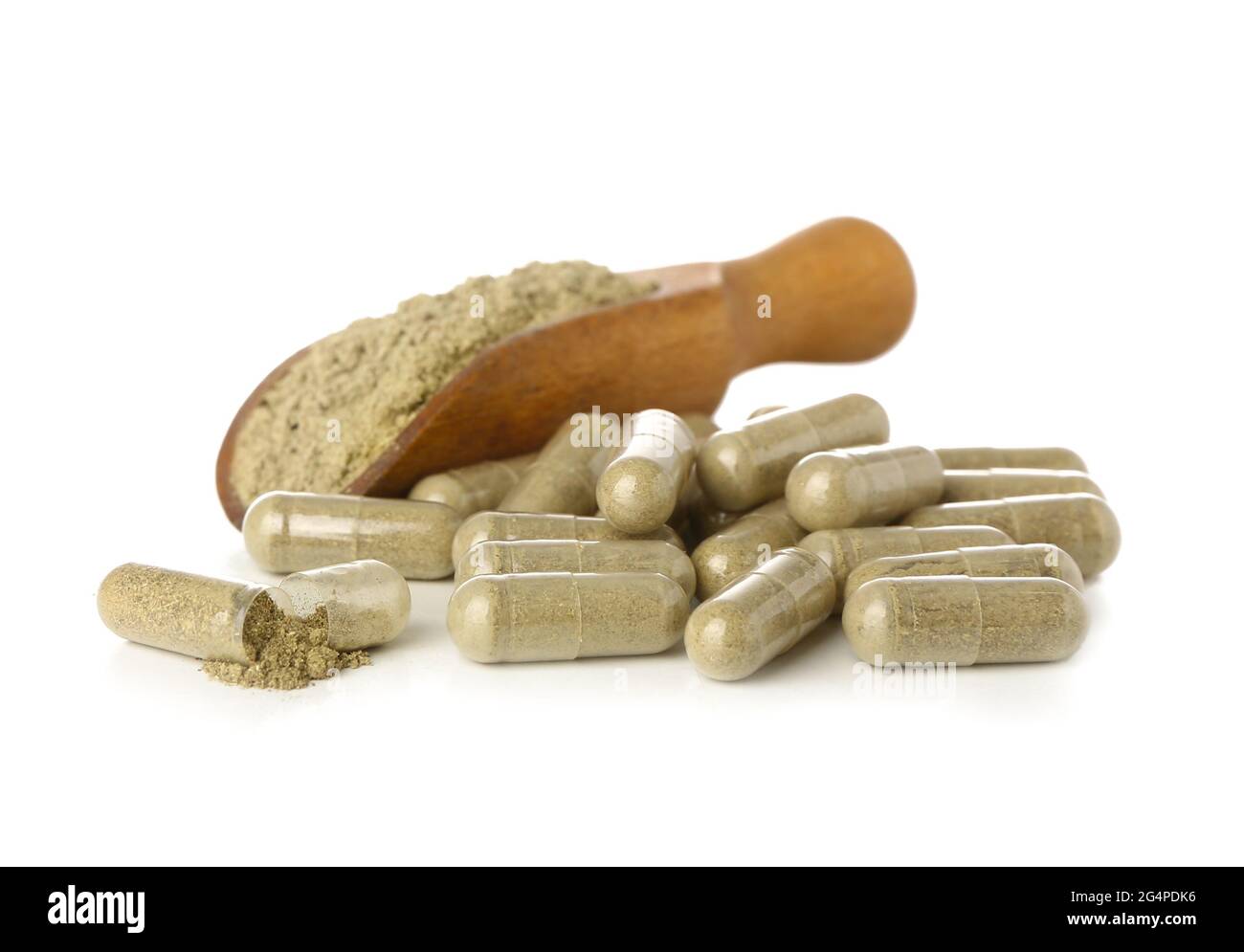 Herbal powder capsules on white background Stock Photo - Alamy