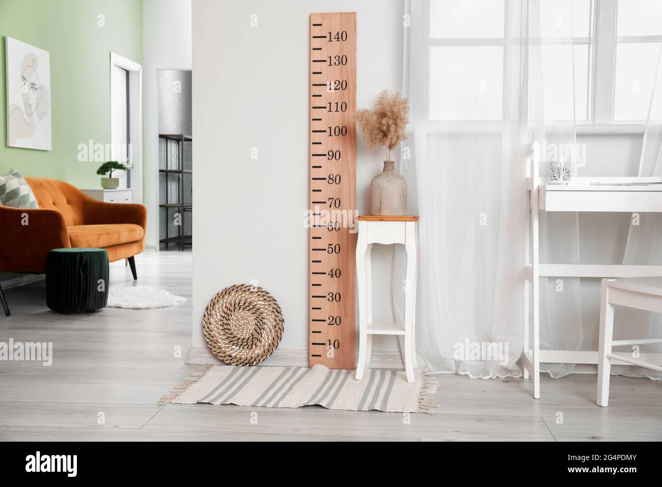 Interior of modern living room with wooden stadiometer Stock Photo - Alamy