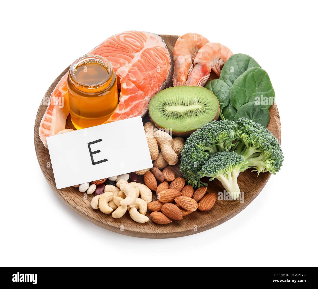 Plate with healthy products rich in vitamin E on white background Stock ...