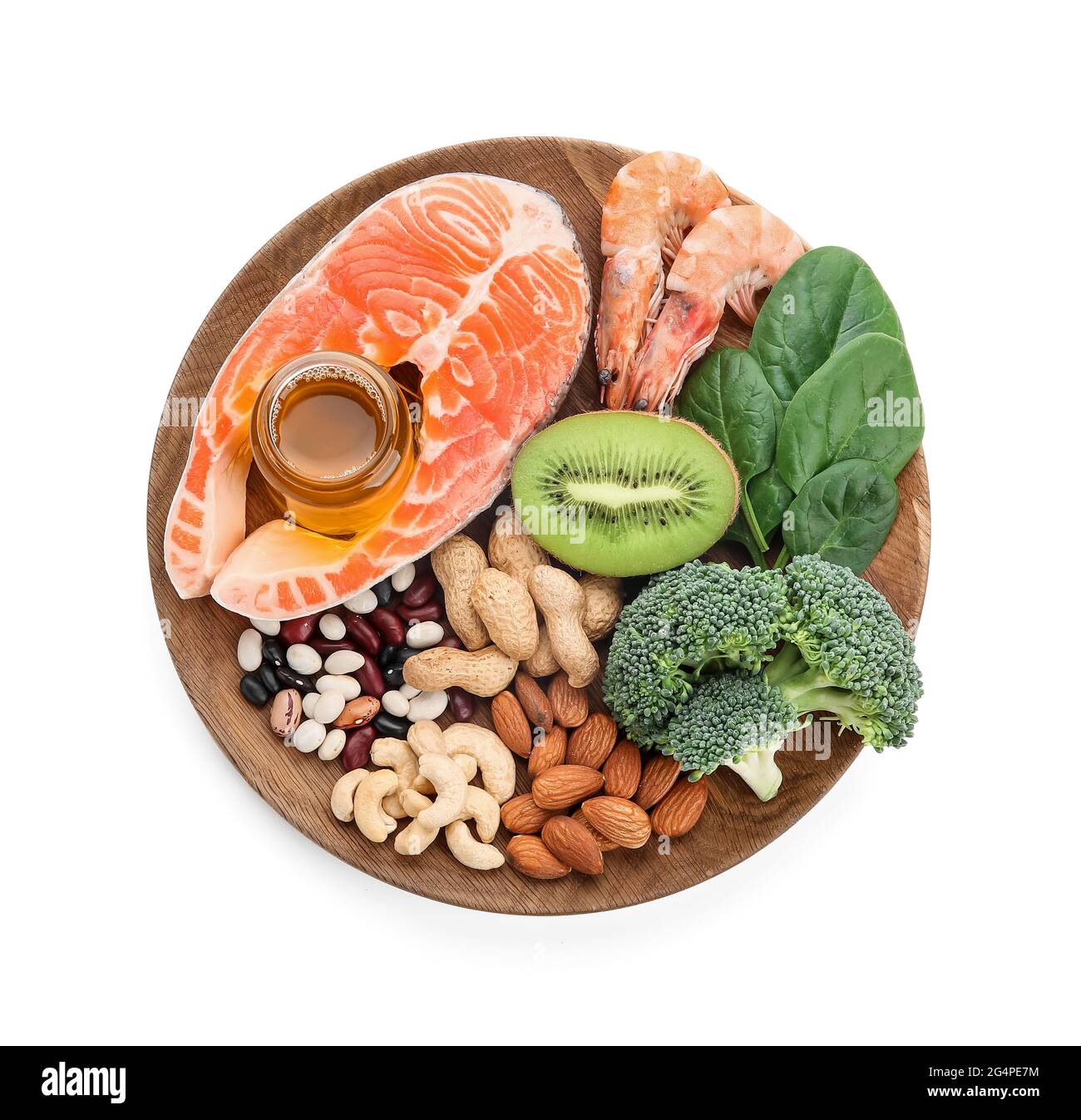 Plate with healthy products rich in vitamin E on white background Stock ...