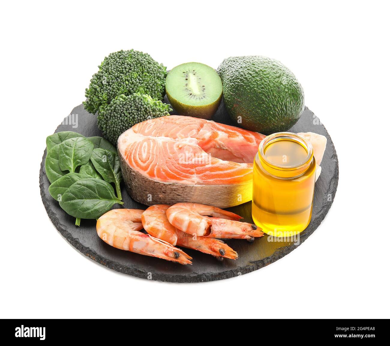 Slate plate with healthy products rich in vitamin E on white background ...